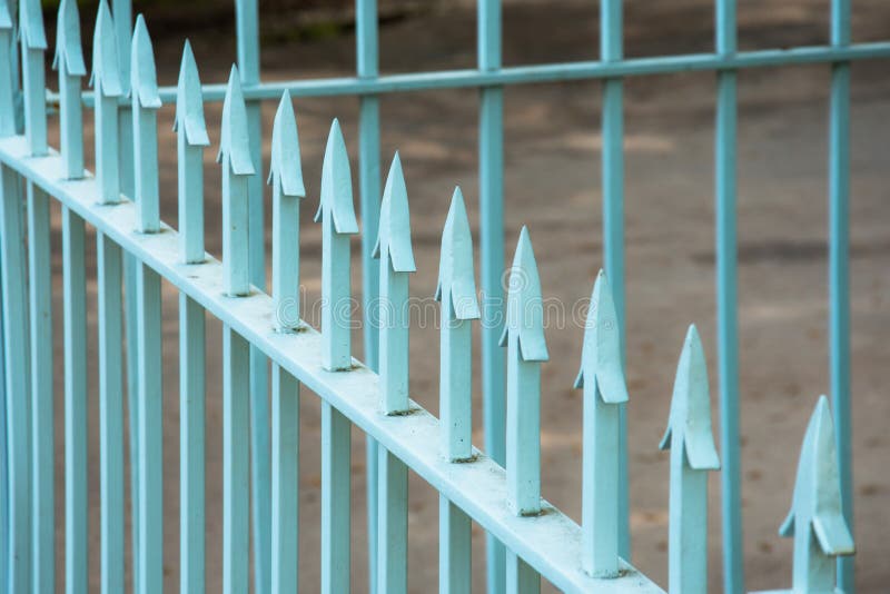 The Sharp Tip of the Metal Fence of the Fence Row. Stock Photo - Image ...