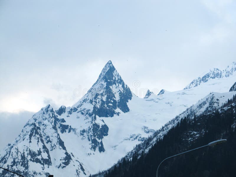 The Sharp Top of the Snow-capped Mountain Stock Image - Image of ...
