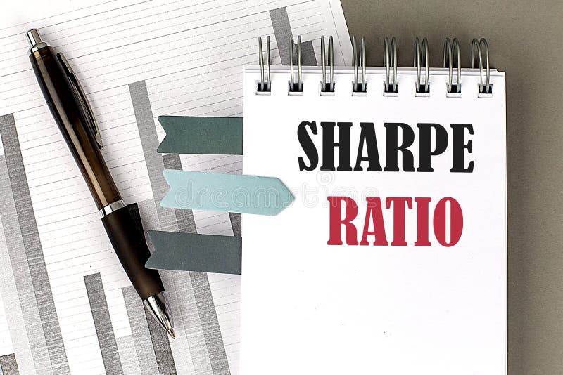 SHARPE RATIO Text on Notebook with Pen, Calculator and Chart on a Grey ...