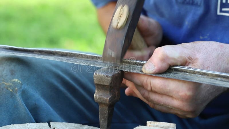 Sharpen the Scythe. Sharpening the Old Scythe with a Hammer. the Farmer ...