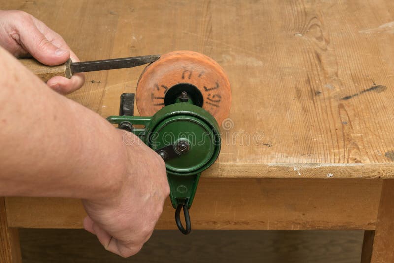 Sharpened with a Manual Drive Stock Photo - Image of whetstone, hand ...