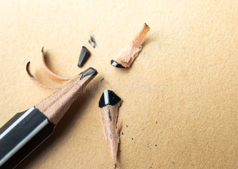 Sharpened Pencil Over a Blank Old Sheet of Paper with a Broken T Stock ...