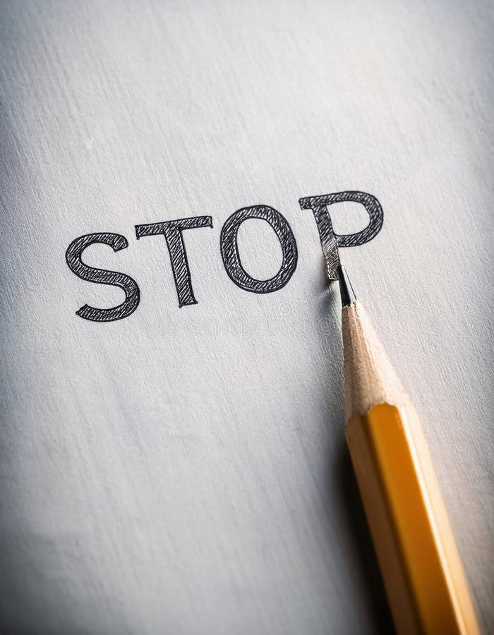 Writing a Stop Sign with a Pencil on a Simple Surface in a Bright ...