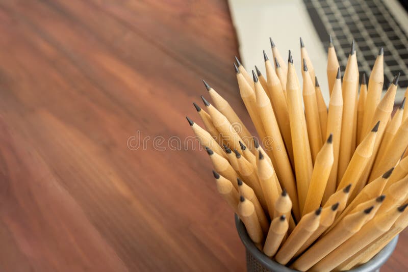 Sharpened Pencils Included in the Can with a Portable Computer Stock ...