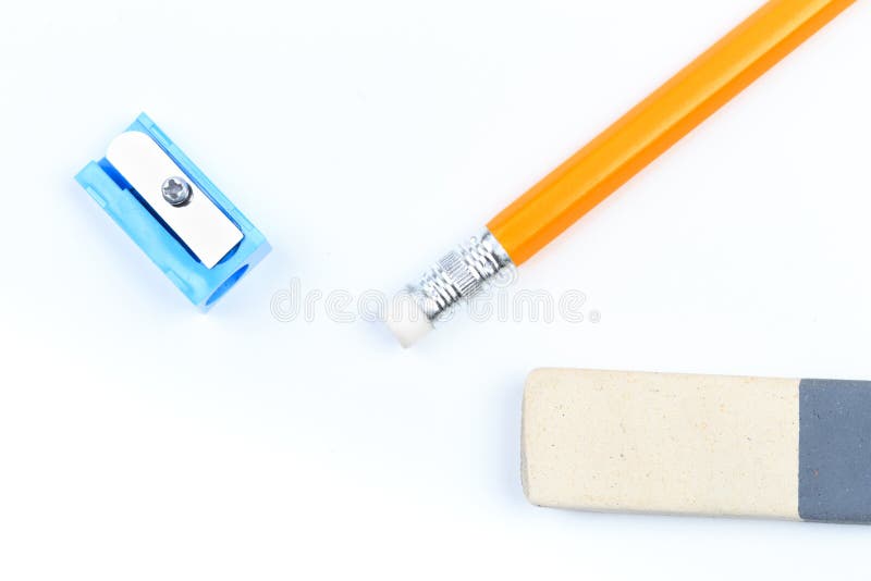 A Sharpener, Eraser and Yellow Pencil Isolated on a White Background ...