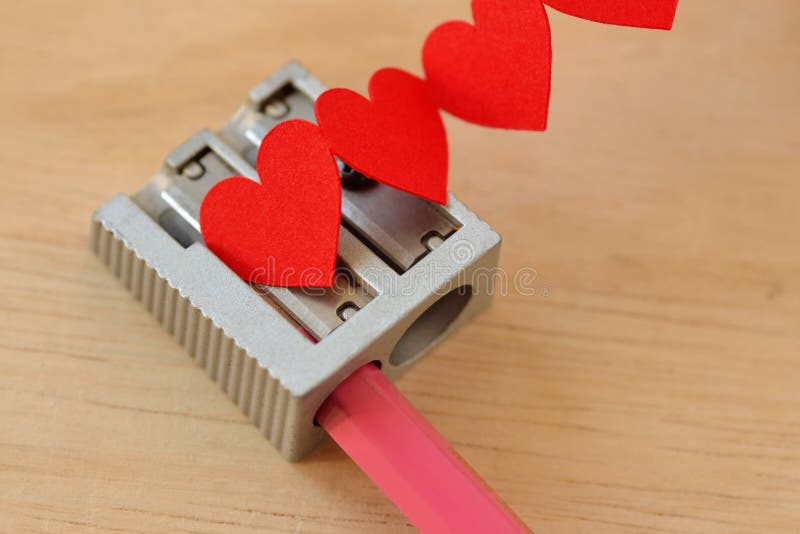 Sharpener and Pink Pencil with Heart Chain - Concept of Love Stock ...