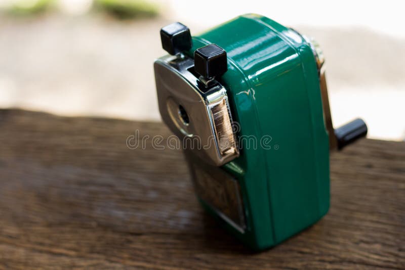 Sharpener on wooden desk. stock photo. Image of wood - 112380368