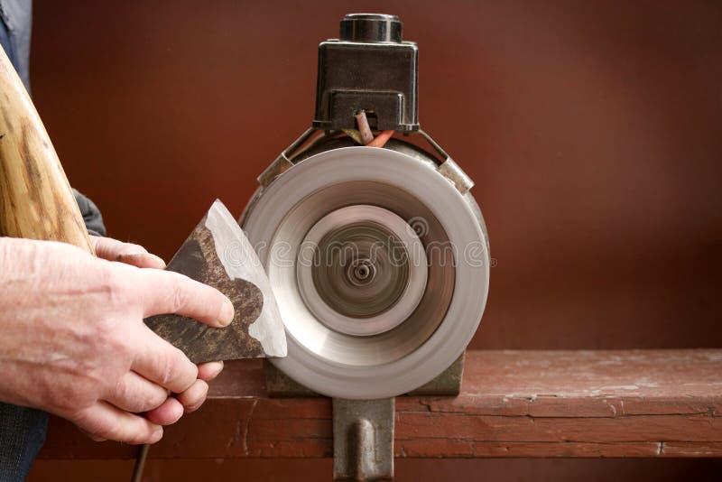 Work with an Emery Machine To Level the Surface of the Wall Stock Photo ...