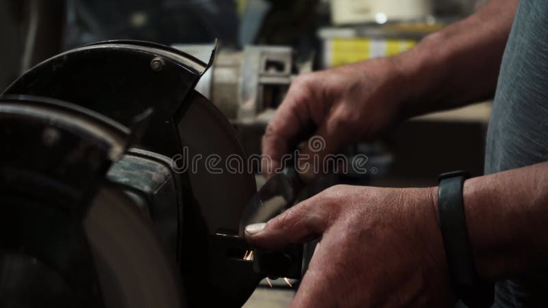 Sharpening a Knife on an Electric Grinding Wheel, Machine Sharpening a ...