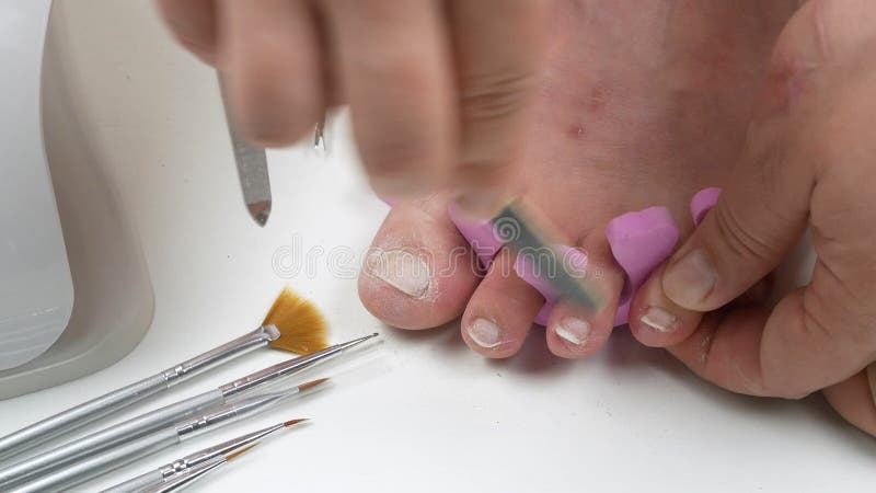 Sharpening the Toenails.Keeps Fingers, Hands and Getting a Pedicure ...