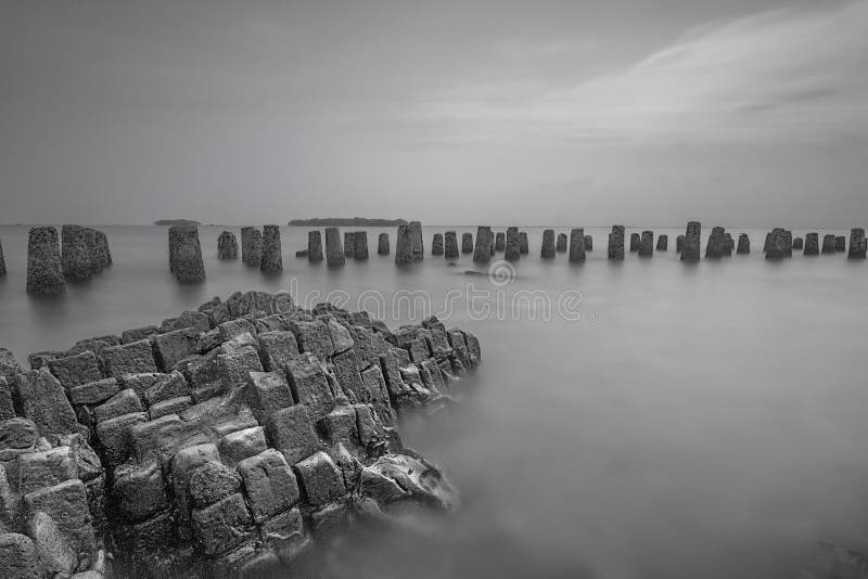 Shattered Dock on the Coast of Darkness Black and White Stock Image ...