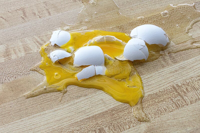 Shattered Egg on Floor stock image. Image of dropped - 267601693