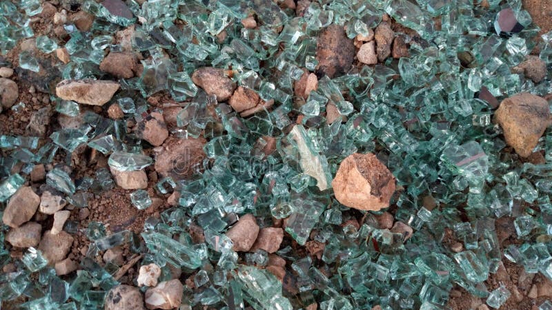 Shattered Glass with Some Pebbles Stock Photo - Image of glass ...