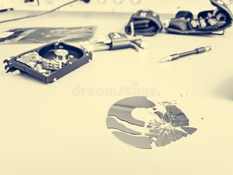 Shattered Platter of Computer Hard Drive Disk. Stock Photo - Image of ... Shattered Platter of Computer Hard Drive Disk. Stock Photo - Image of ...