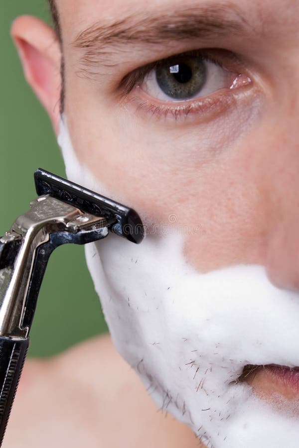 Man Shaving Face stock photo. Image of clothing, razor - 10198140