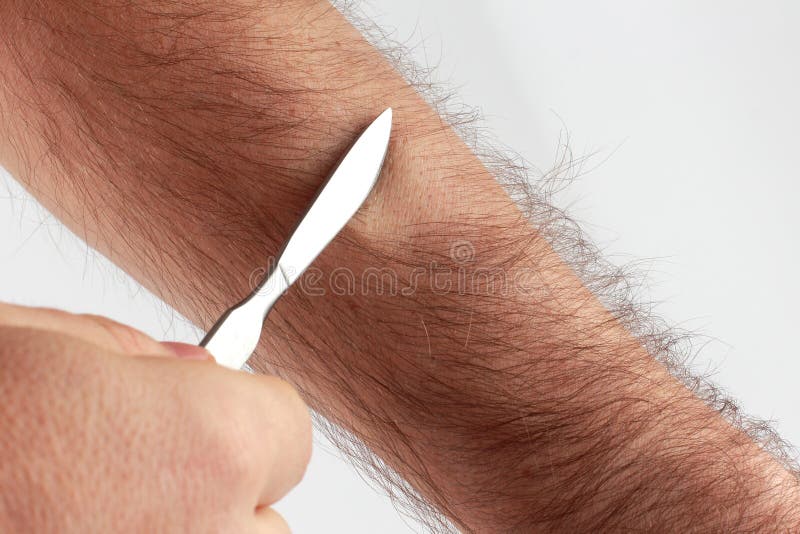 Shaving Arm Hairs To Check Sharpness Sharpening a Scalpel Stock Image ...