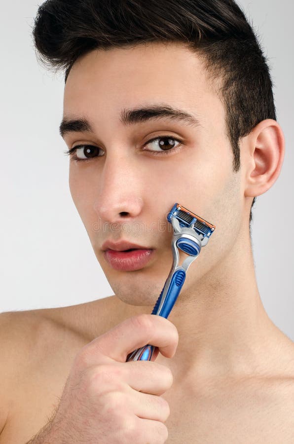 Shaving the Beard with a Razor. Stock Photo - Image of hand, face: 30493294