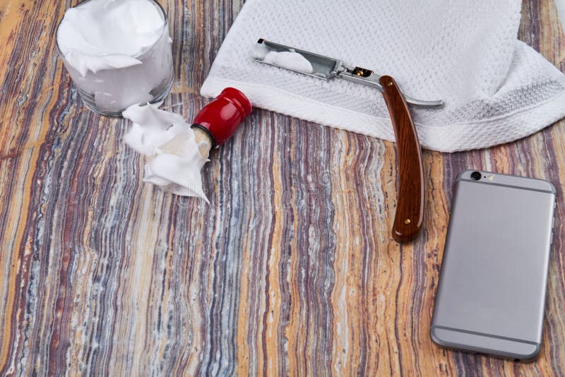 Shaving Stuff and Smartphone on Rustic Wooden Table. Stock Image ...