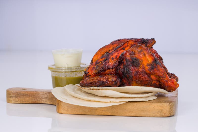 Shawai Chicken with Kuboos and Dips Stock Photo - Image of barbecue ...