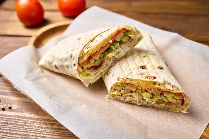 Shawarma Cut in Half on a Plate Stock Photo - Image of lavash, onion ...