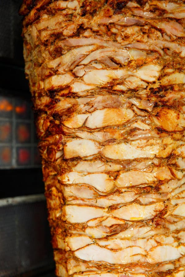 Shawarma meat being cut stock image. Image of cuisine - 81663493