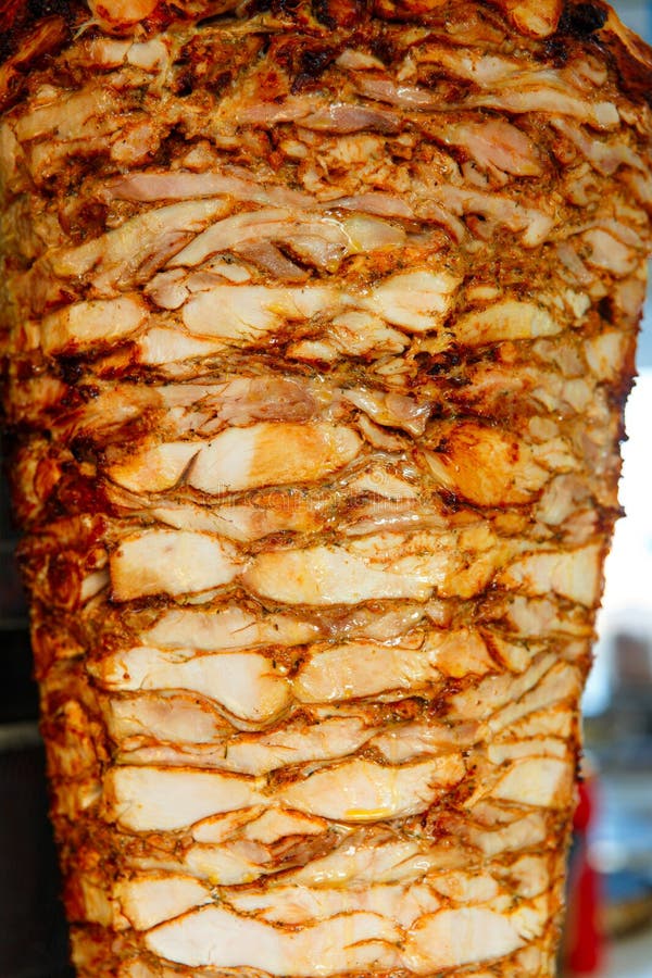 Shawarma meat being cut stock image. Image of cuisine - 126499905