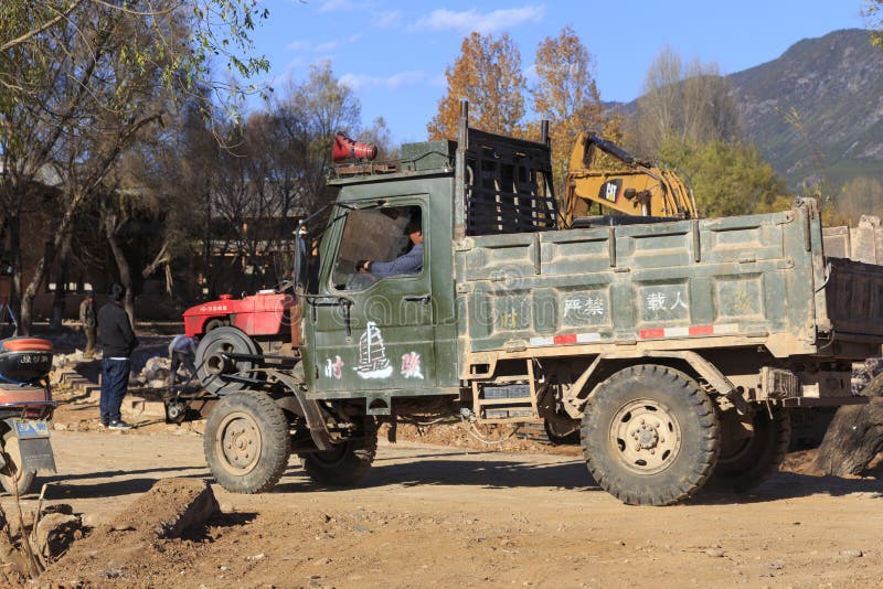 Old truck in Shaxi China editorial photo. Image of cargo - 117226671