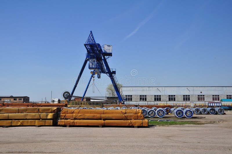 Shear Legs Crane at the Storage Yard Stock Photo - Image of crane ...