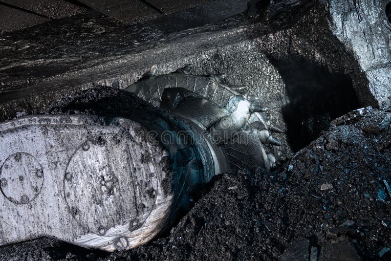 The Drill Head of a Mine Roadheader Close-up. the Drill is Equipped ...