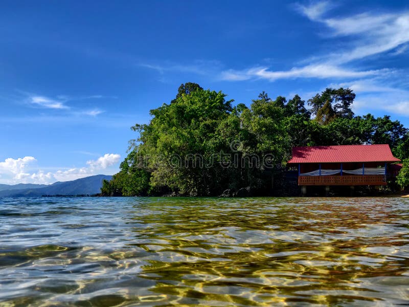 A shed on the lake poso stock image. Image of water - 210982725