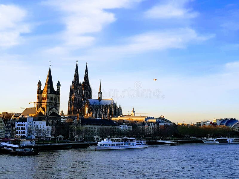 Sunset in Cologne stock image. Image of watercraft, town - 231671511