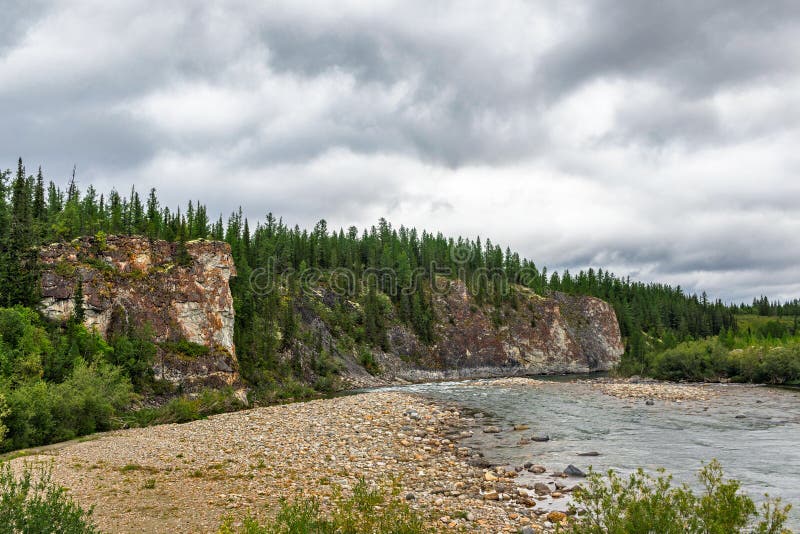 Sheer Cliff Overgrown with Forest in the Ural Mountains Stock Photo ...