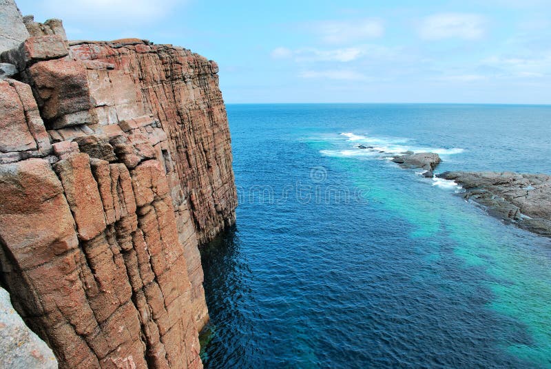 Sheer Coastal Rock Formation Stock Photo - Image of outdoors, rocks ...