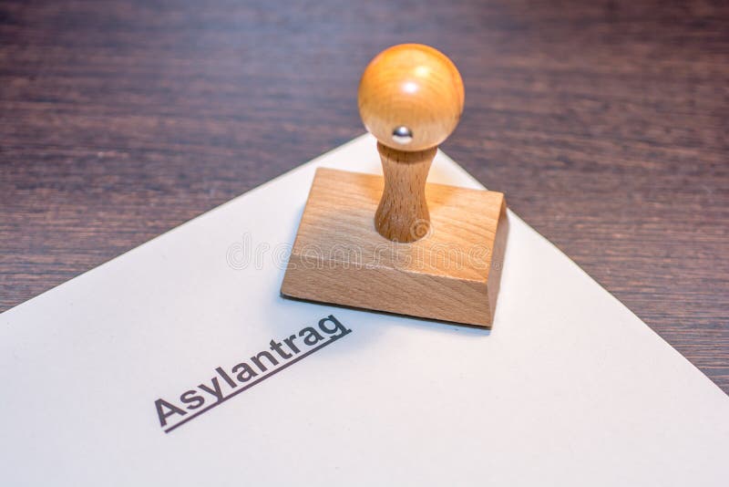 Application for Asylum with Wooden Stamp with the German Word for ...
