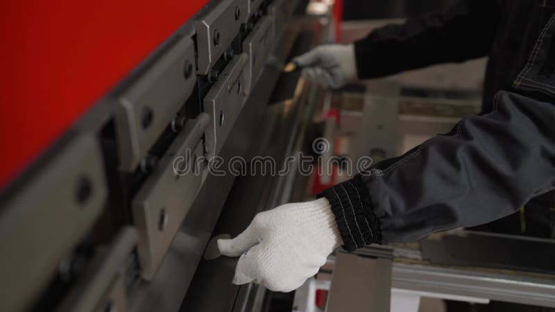 Man Working with Sheet Metal and Special Machine Tools for Bending ...