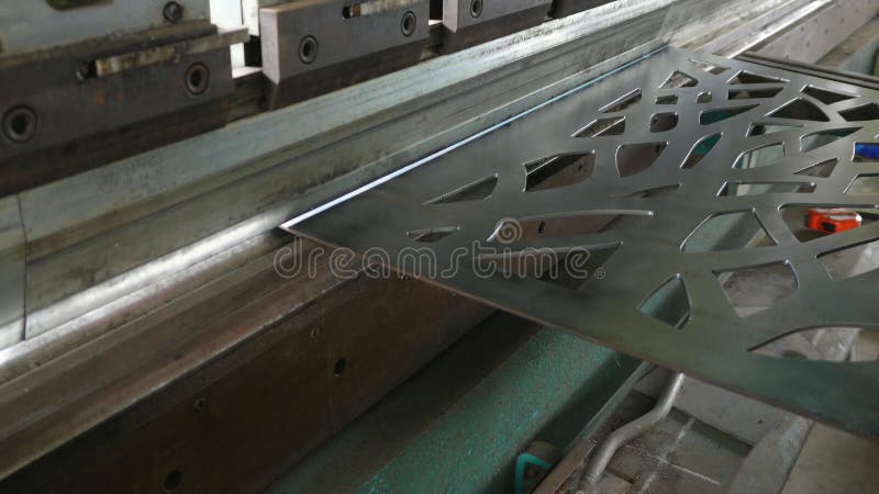 Sheet Metal Bending Machine. the Metal is Bent Under a Press Stock ...