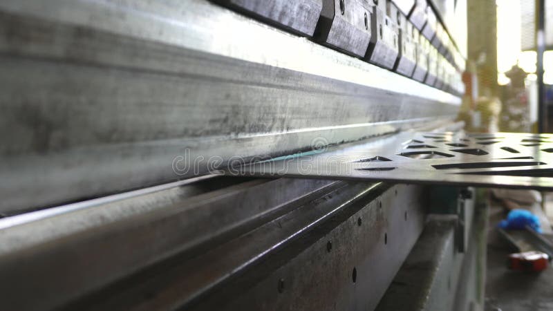 Sheet Metal Bending Machine. the Metal is Bent Under a Press Stock ...