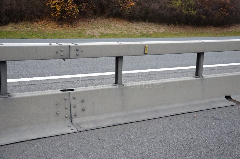 Sheet Metal Movable Center Barrier on the Highway. Serves As an Easily ...