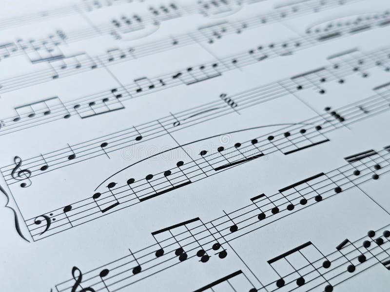Sheet Music Featuring Intricate Musical Notation on a White Background ...