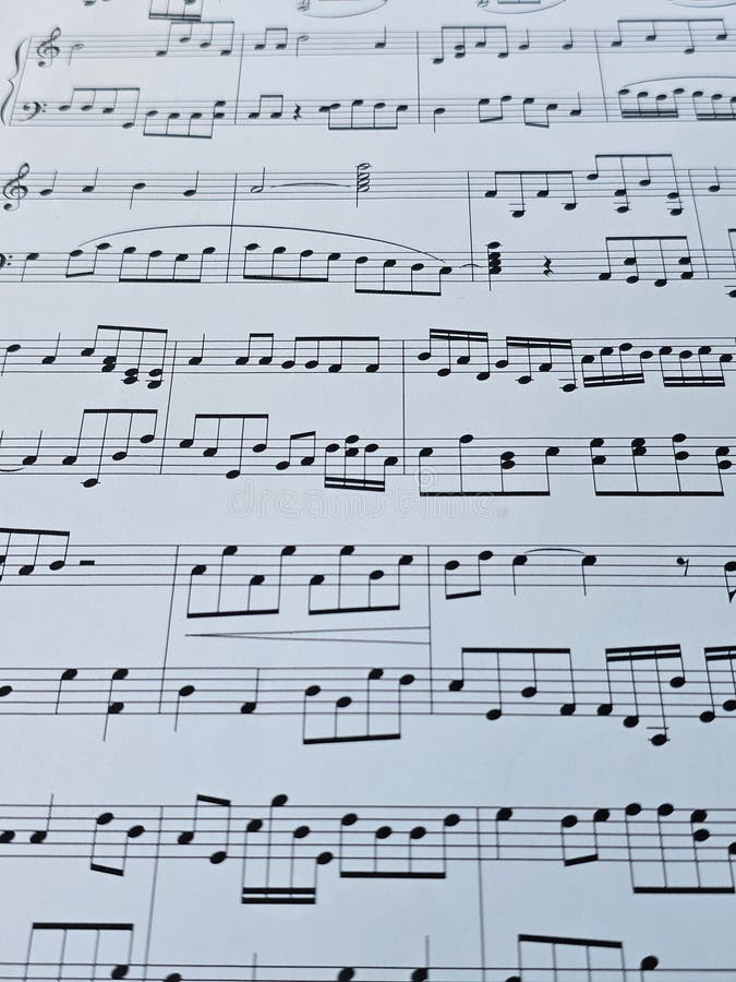 Sheet Music Featuring Various Musical Notes Arranged Across Multiple ...