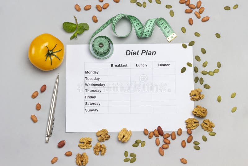 Sheet of Paper with Diet Plan for Week, Measuring Tape, Yellow Tomato ...