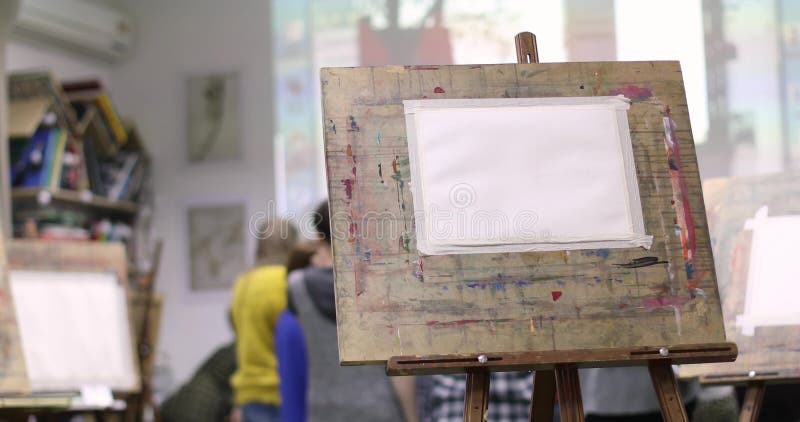 Students in a Classroom are Focused on Studying with Books and a ...