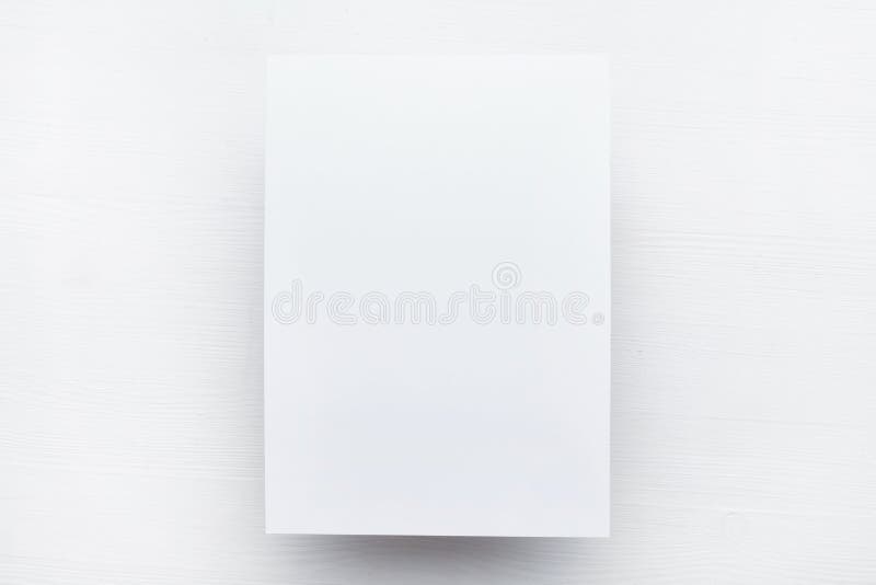 A Sheet of Paper Lies Top View on a Wooden Table with Copy Space Stock ...
