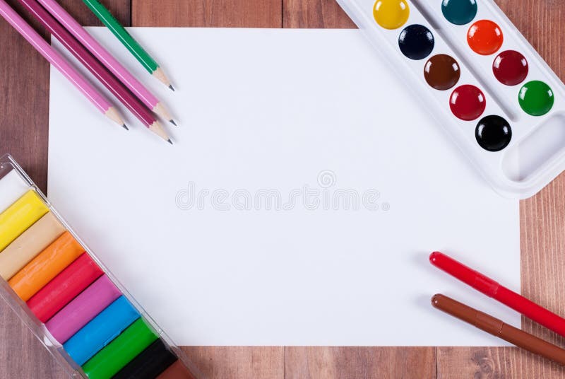 Sheet of Paper Lying in the Corners and Accessories for Drawing and ...