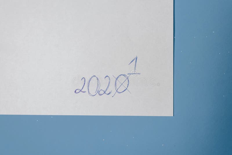 A Sheet of Paper with 2020 Written and Crossed Out with 0 Written 1 on ...