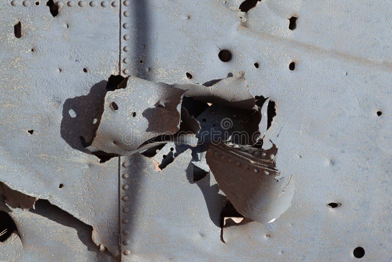 Sheet of Steel Pierced by an Artillery Shell Stock Photo - Image of ...