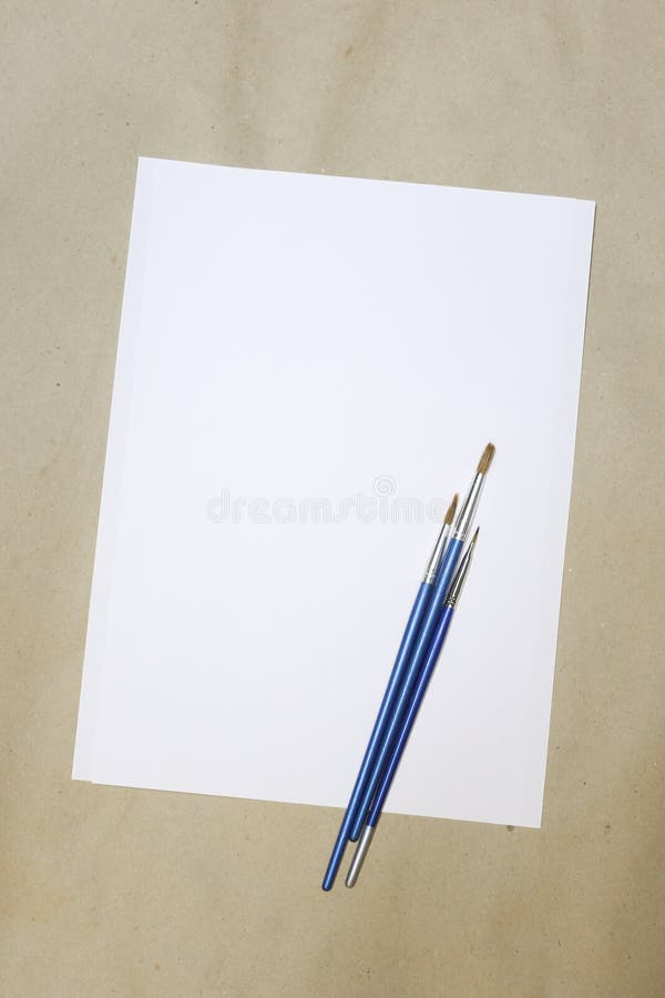 Sheet of White Paper and Artistic Brushes on a Crafting Background ...