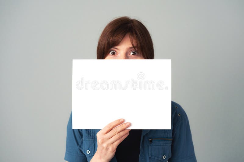 Sheet of White Paper Held in Front of the Girl S Face Stock Photo ...