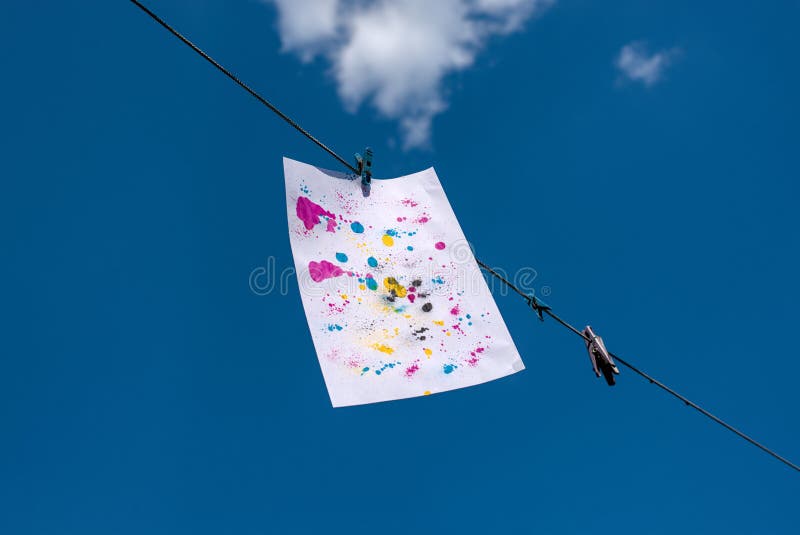 Sheet of White Paper with Paint Stains on a Rope Stock Image - Image of ...