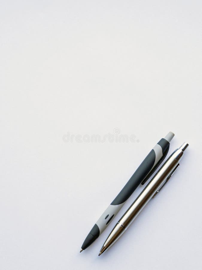A Sheet of White Writing Paper and Two Pens Stock Photo - Image of ...